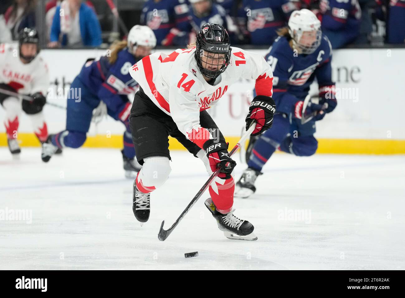 Canada defender Renata Fast (14) controls the puck during the third ...