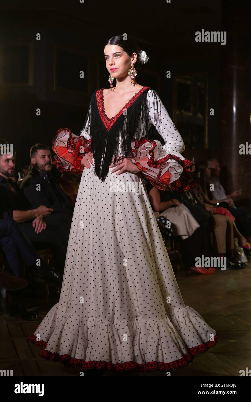 A model walks in a Sueno Flamenco design at the International Flamenco ...