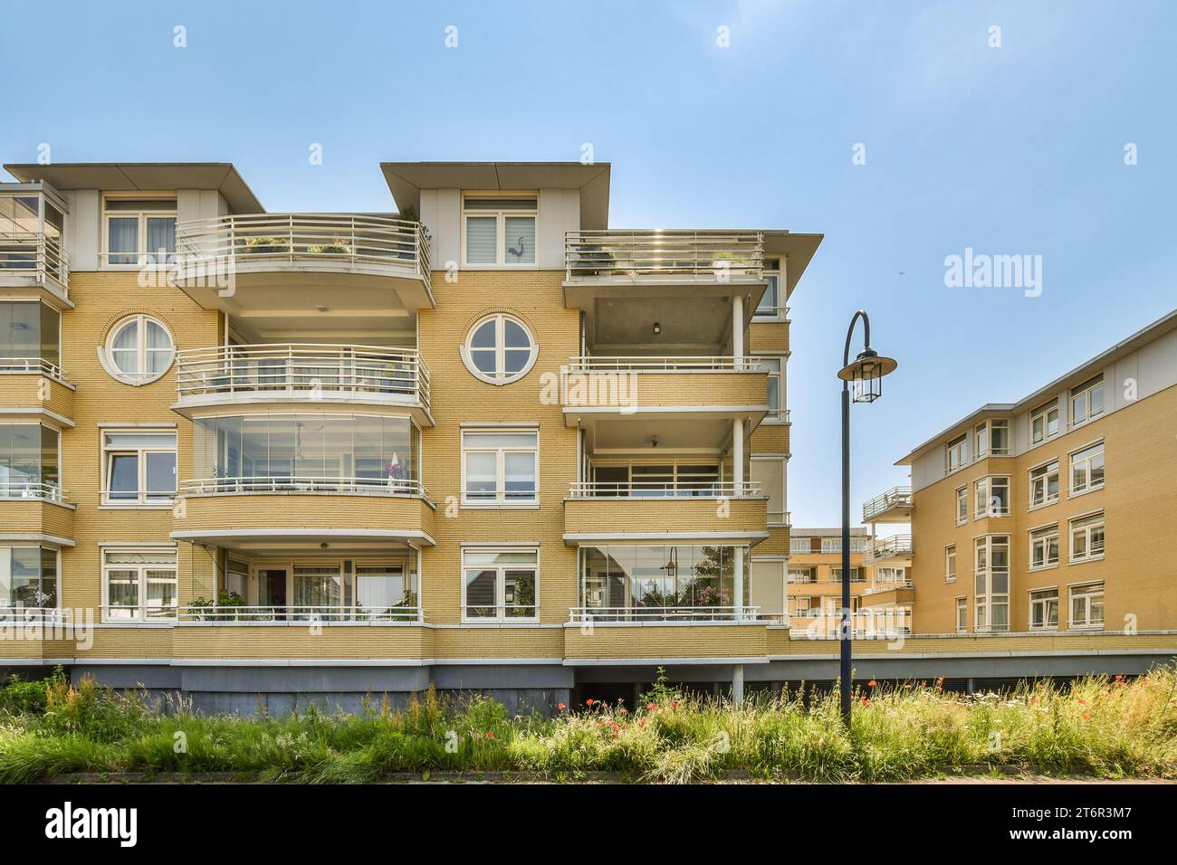 an apartment building with balks on the balconys and balks on the ...