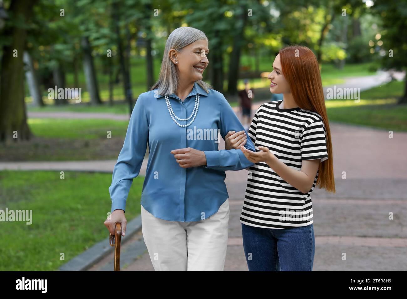 Lady with cane hi-res stock photography and images - Alamy