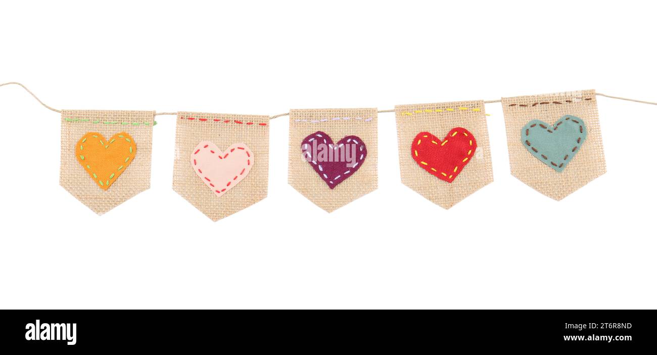 Bunting with burlap flags and hearts isolated on white, top view Stock ...