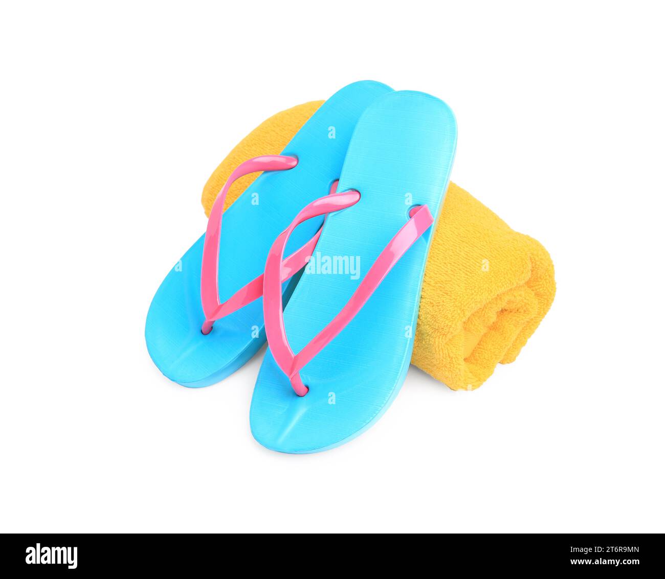Yellow terry towel and flip flops isolated on white, top view. Beach ...