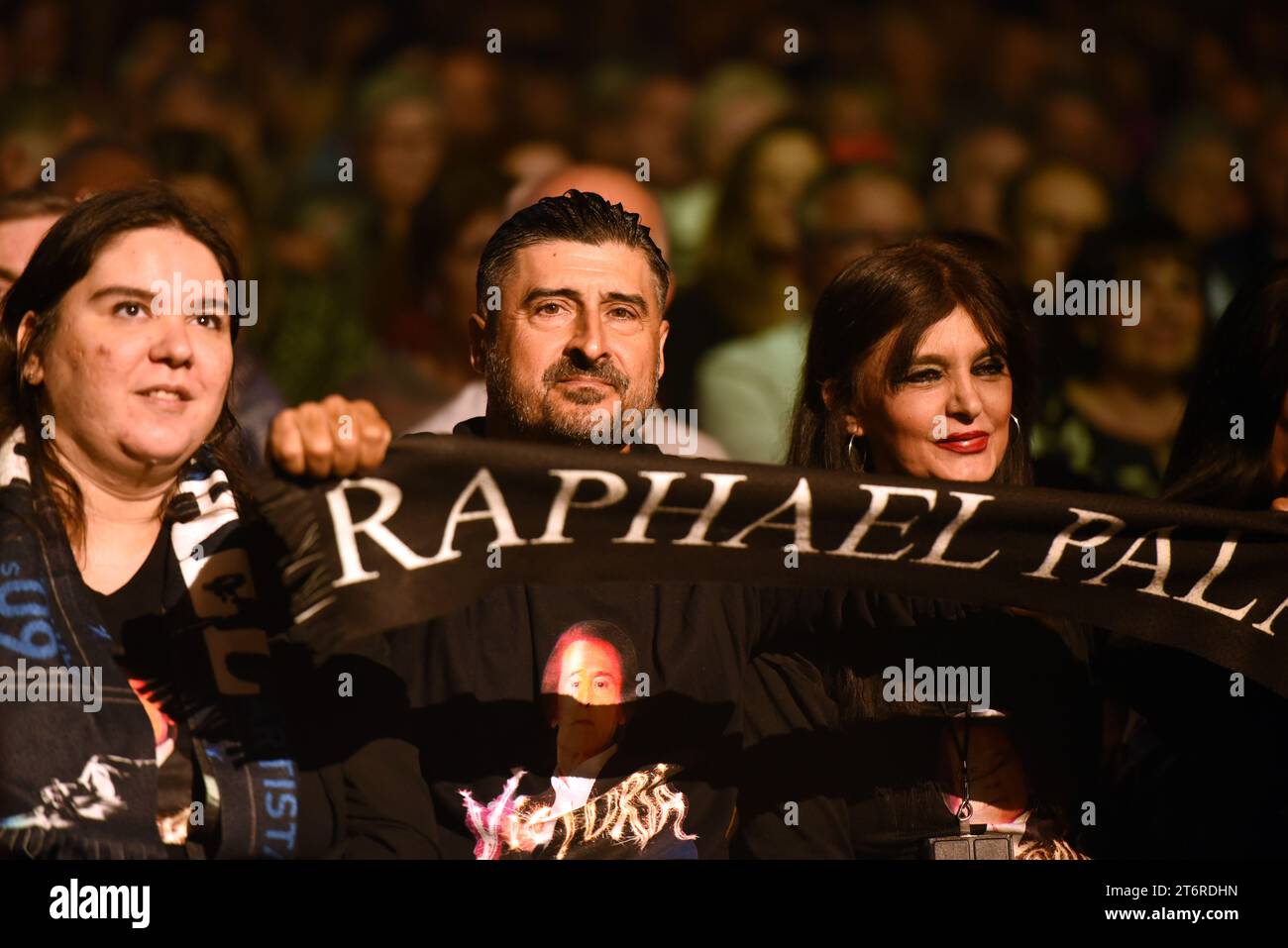 A fan holds a scarf with Raphael's name at the "San Miguel Tarraco ...