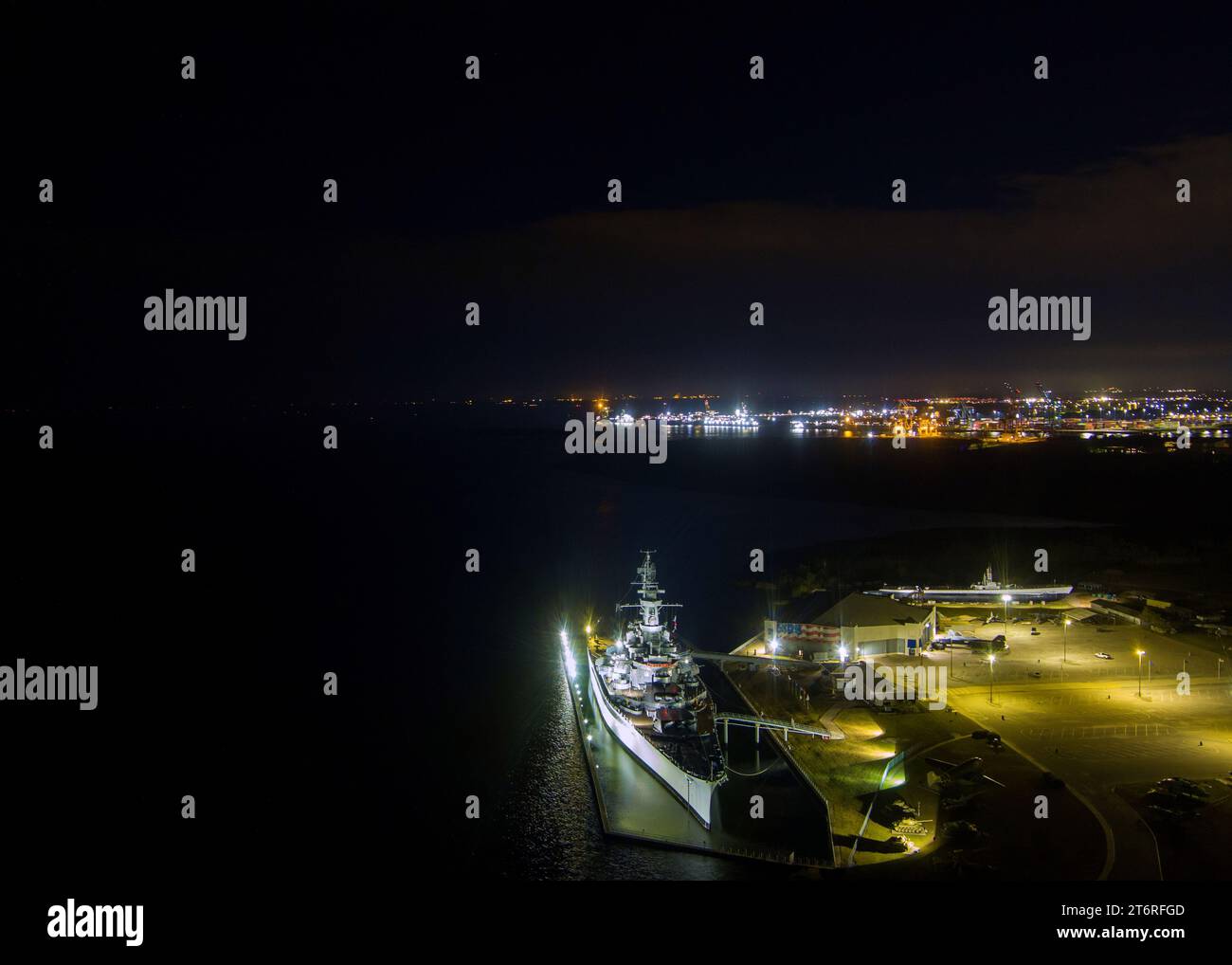 Aerial view of the USS Alabama battleship in Mobile Bay at night Stock ...