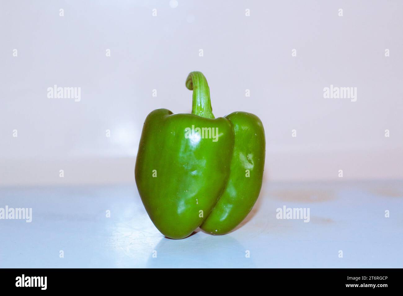 green capsicum with white background Stock Photo - Alamy