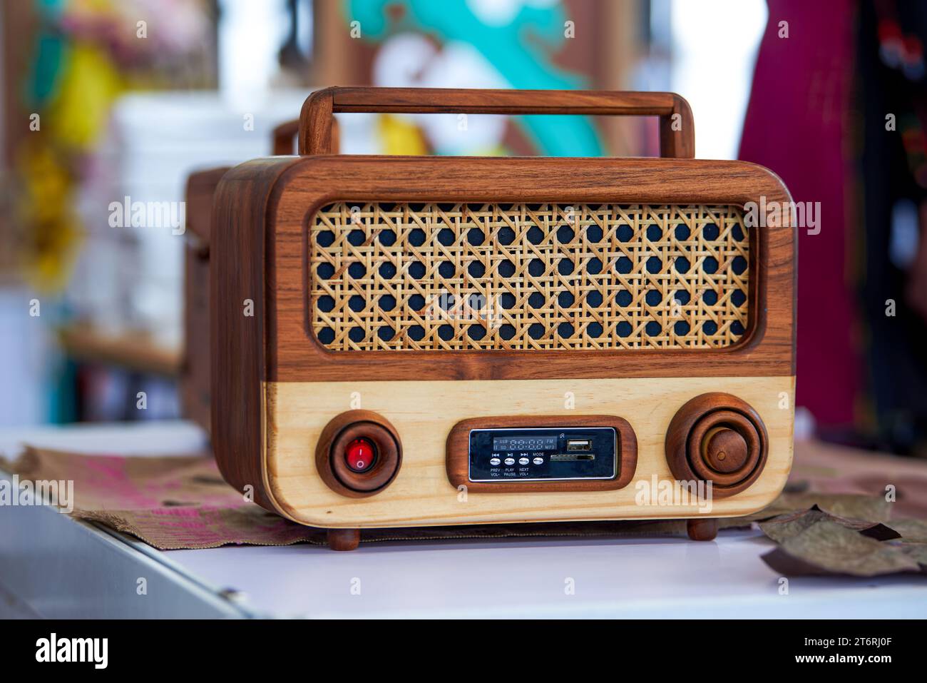 A radio with a retro-designed bamboo casing and mesh Stock Photo - Alamy