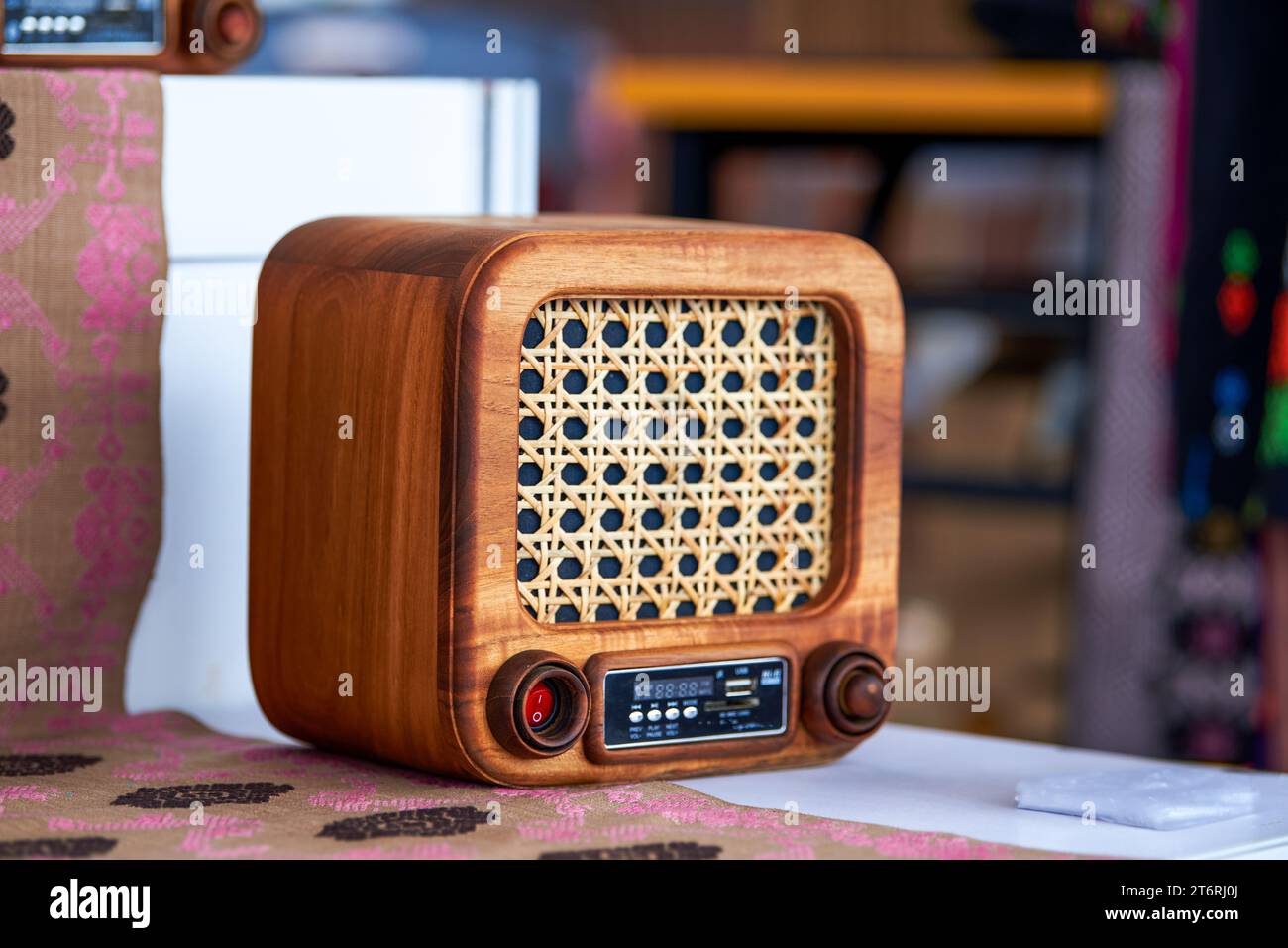 A radio with a retro-designed bamboo casing and mesh Stock Photo - Alamy