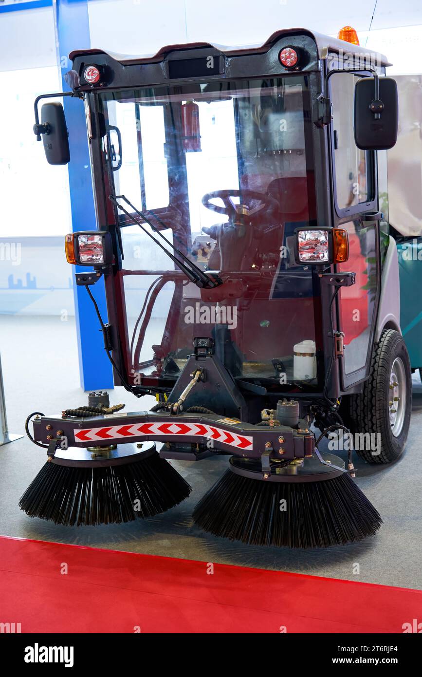 A brand new garbage sweeper truck on display in the showroom Stock ...