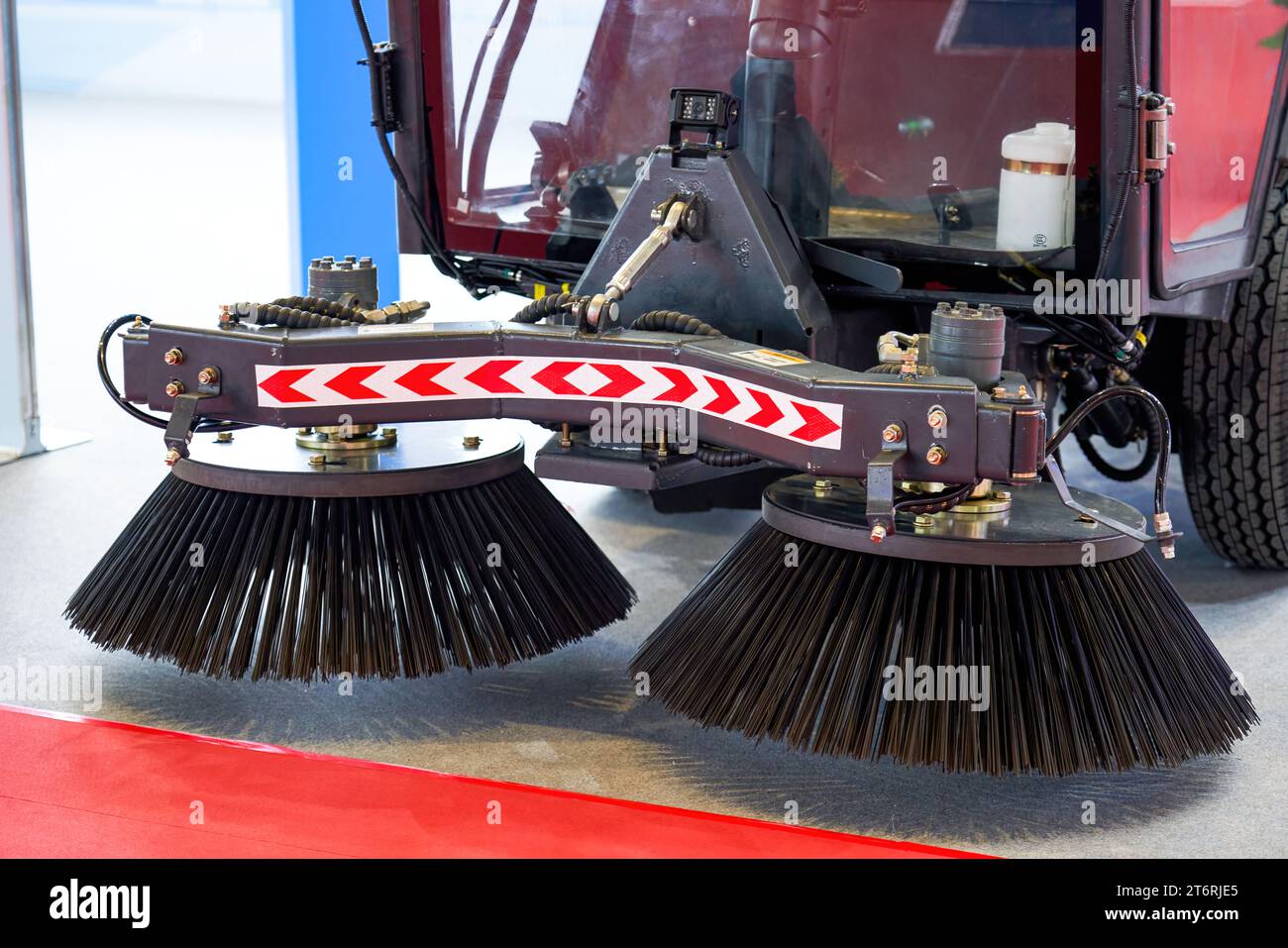 A brand new garbage sweeper truck on display in the showroom Stock ...