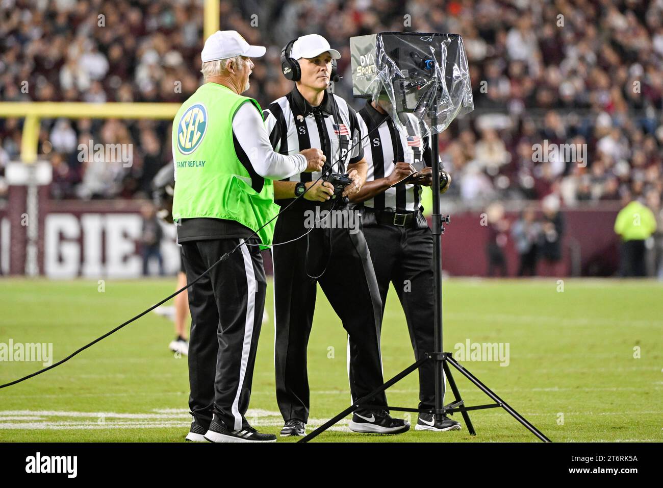 COLLEGE STATION, TX - NOVEMBER 11: Referee Kyle Olson reviews a first half Aggie interception ...
