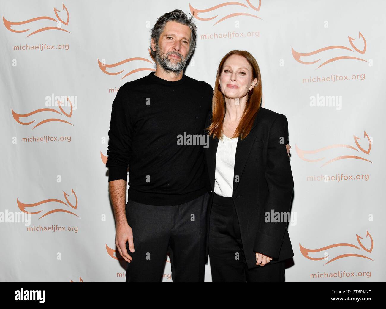 Bart Freundlich, left, and Julianne Moore attend the Michael J. Fox ...