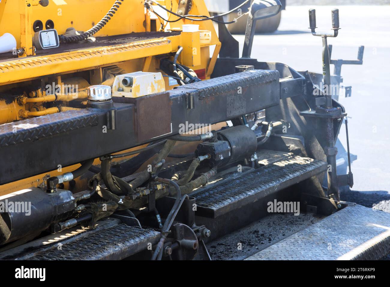 In course of road construction bitumen asphalt layer is laid on top ...