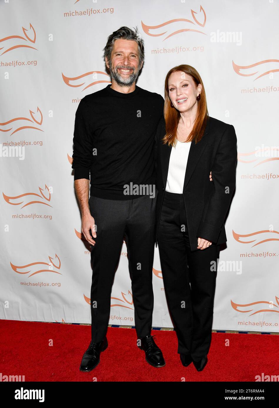 Bart Freundlich, left, and Julianne Moore attend the Michael J. Fox ...