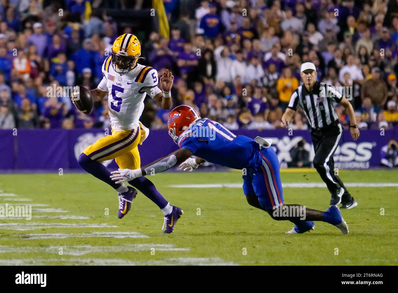 November 11, 2023: LSU Tigers quarterback JAYDEN DANIELS (5) runs past ...