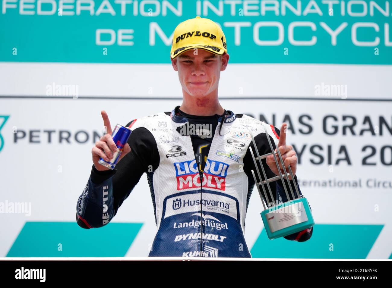 Winner Dutch rider Collin Veijer celebrates on the podium after the ...