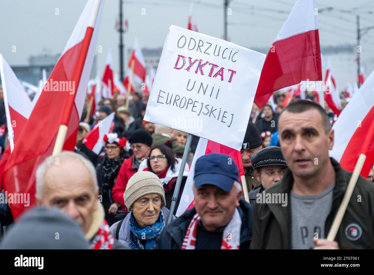 A women carries a banner saying: reject the dictates of the European ...