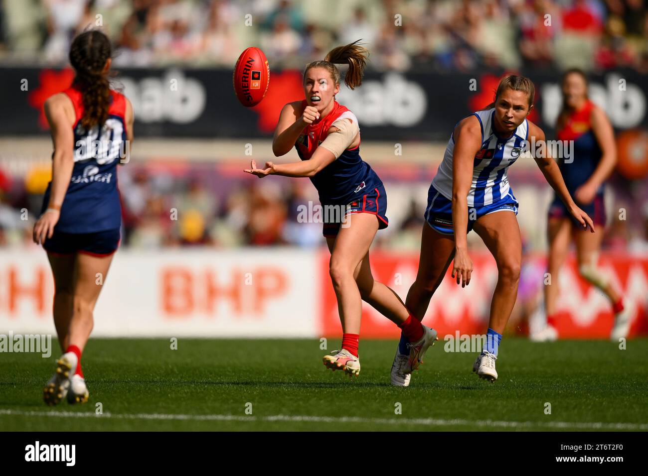 Olivia Purcell of the Demons handballs during the AFLW Qualifying Final ...
