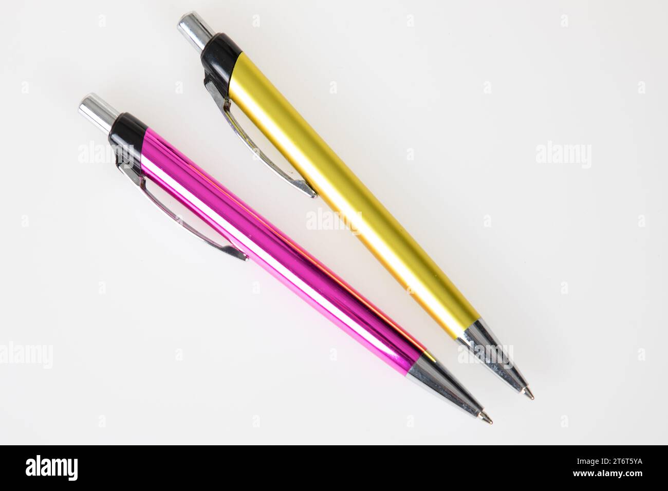 ballpoint pencil simple two ballpoint pens pink yellow colors on white ...