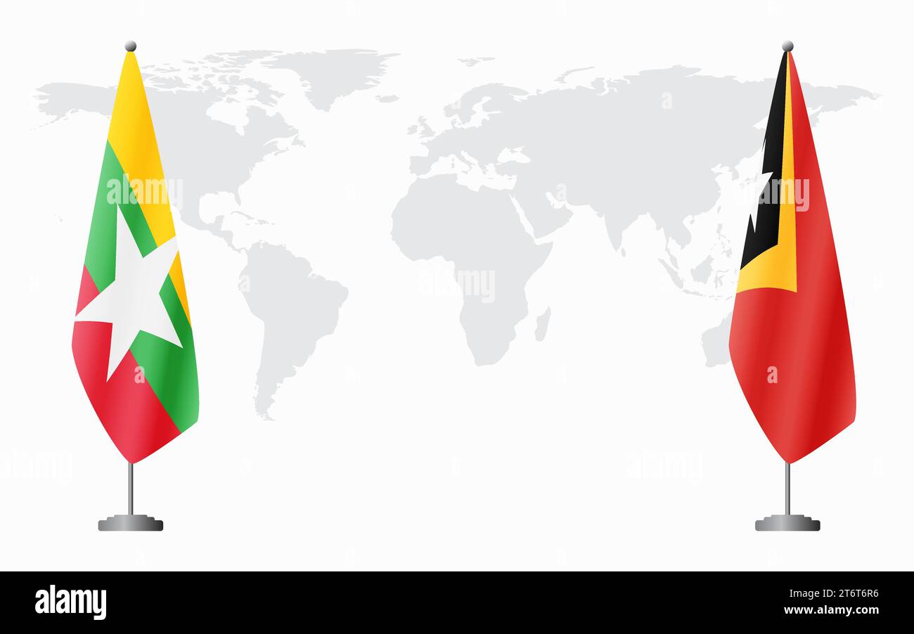 Myanmar and East Timor flags for official meeting against background of ...