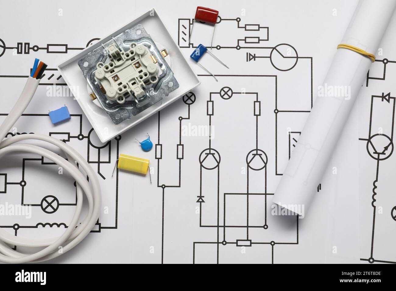 Wires and disassembled light switch on wiring diagrams, top view Stock ...