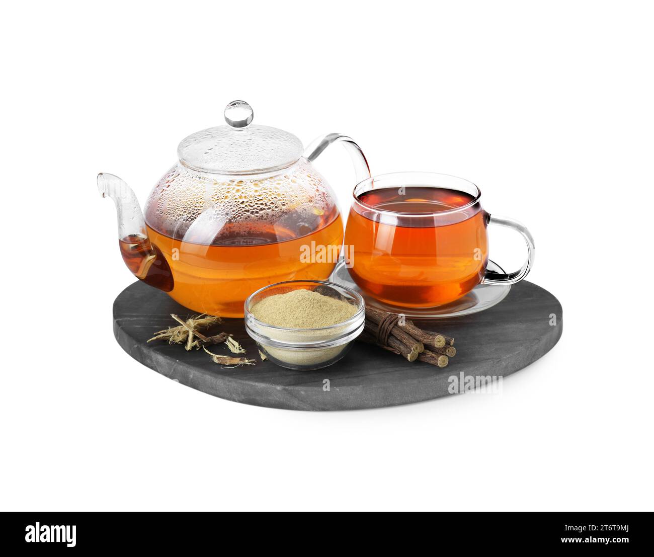 Aromatic licorice tea, dried sticks of licorice root and powder on ...