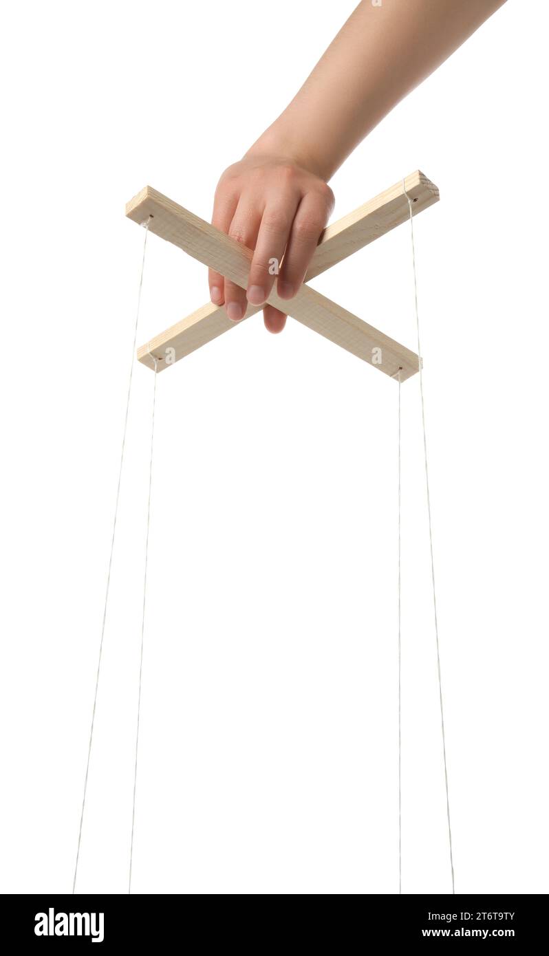 Woman pulling strings of puppet on white background, closeup Stock ...