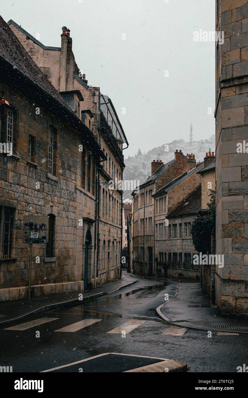 An atmospheric view of a quaint cobblestone alleyway in a historic old ...