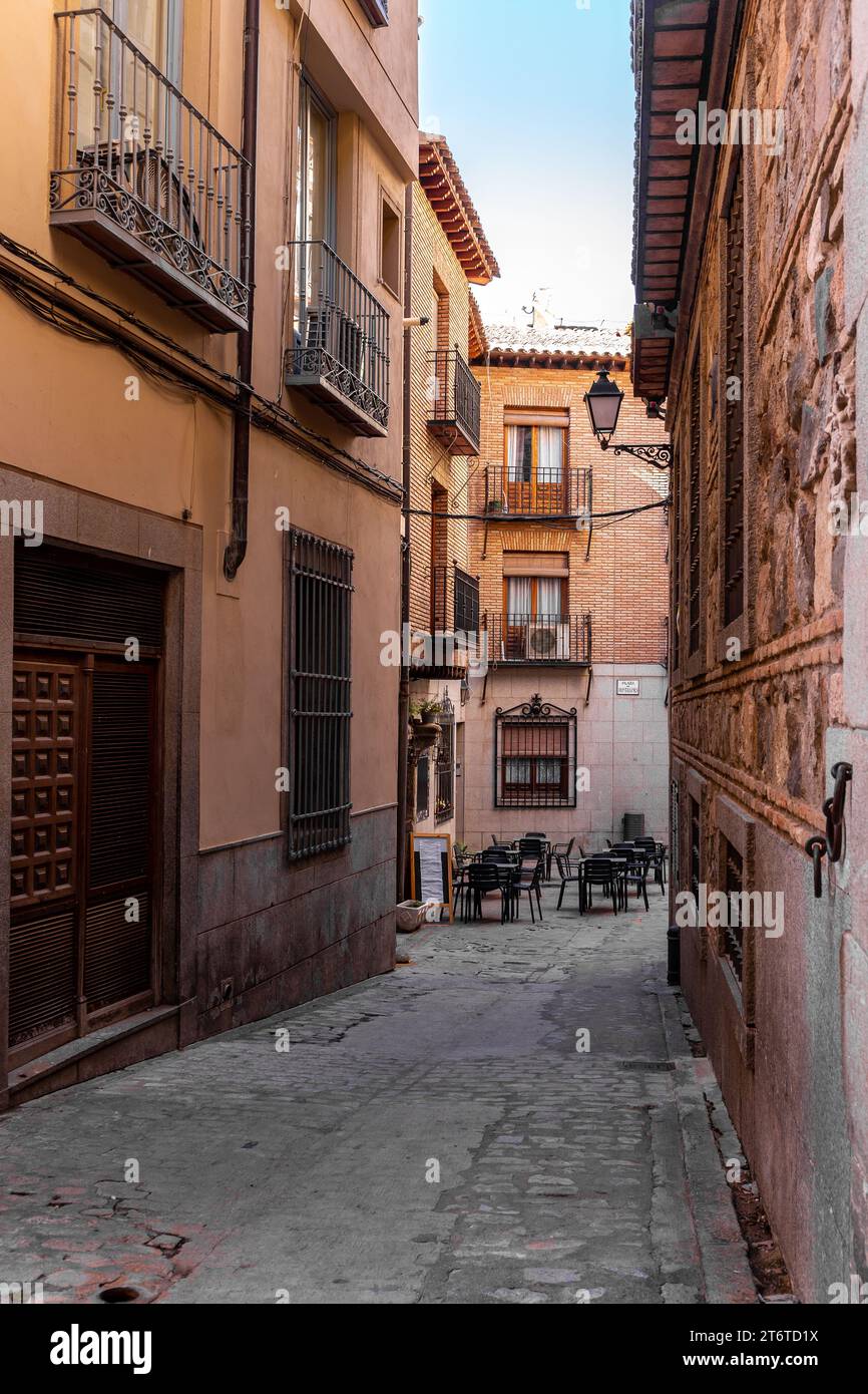 Narrow Spanish cobbled street Plaza de Montalbanes (translation ...