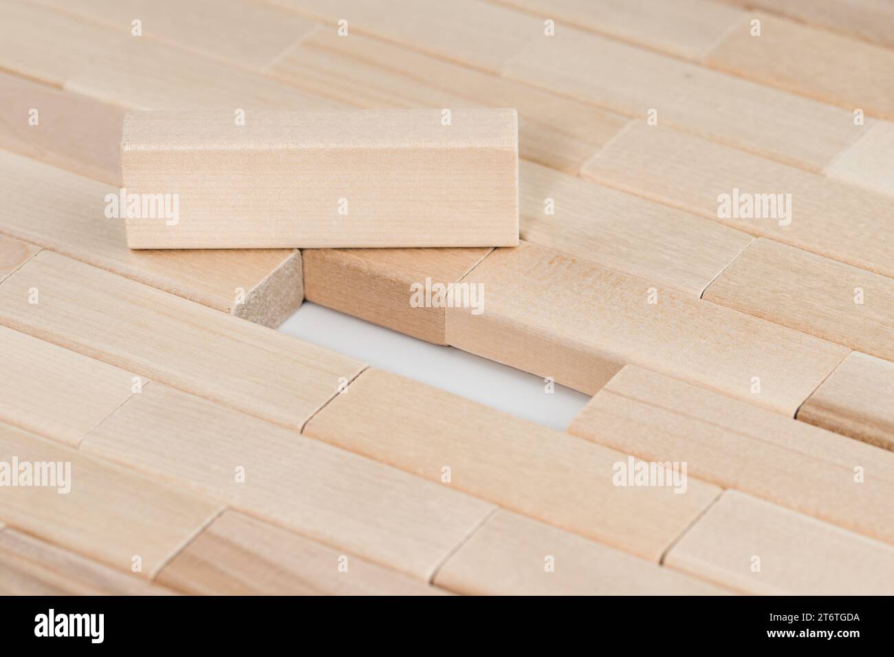 Stacking blank wood block on top. Wooden puzzles on wooden desk, top ...