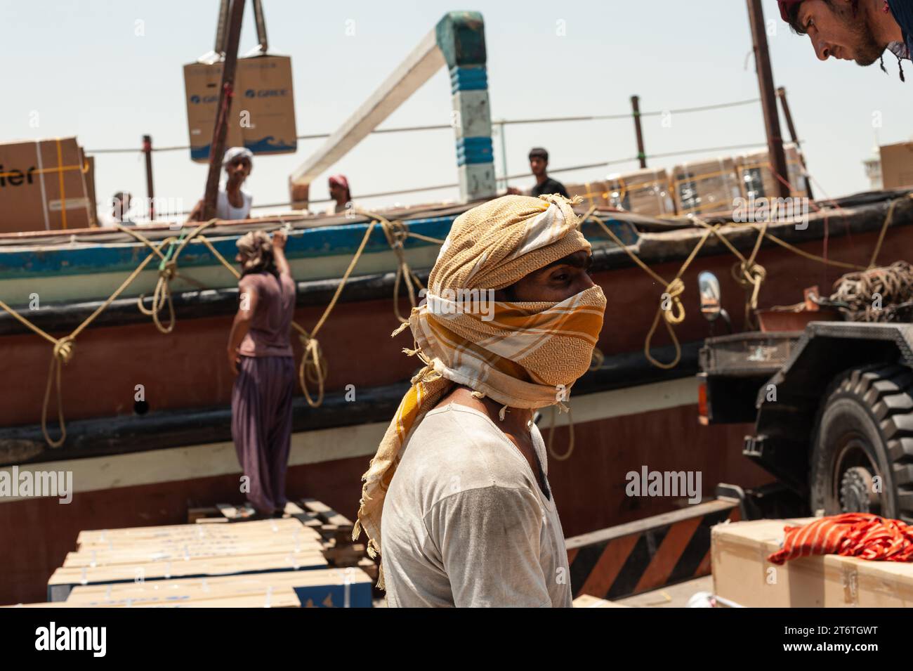 Dubai, United Arab Emirates. June 29th 2019 Foreign workers unloading ...
