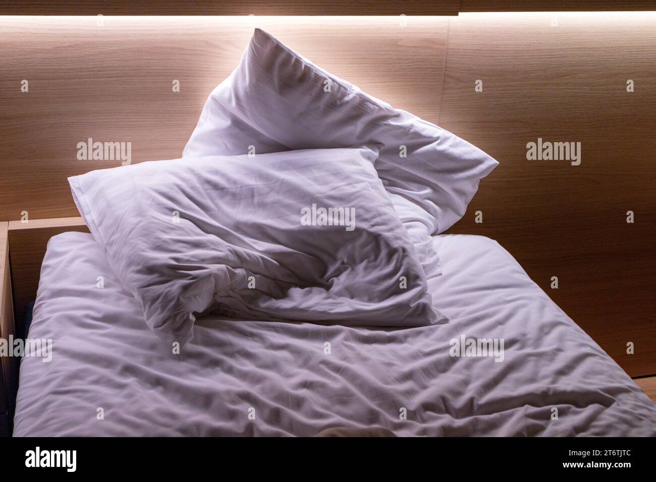 Two pillows crumpled bed hi-res stock photography and images - Alamy