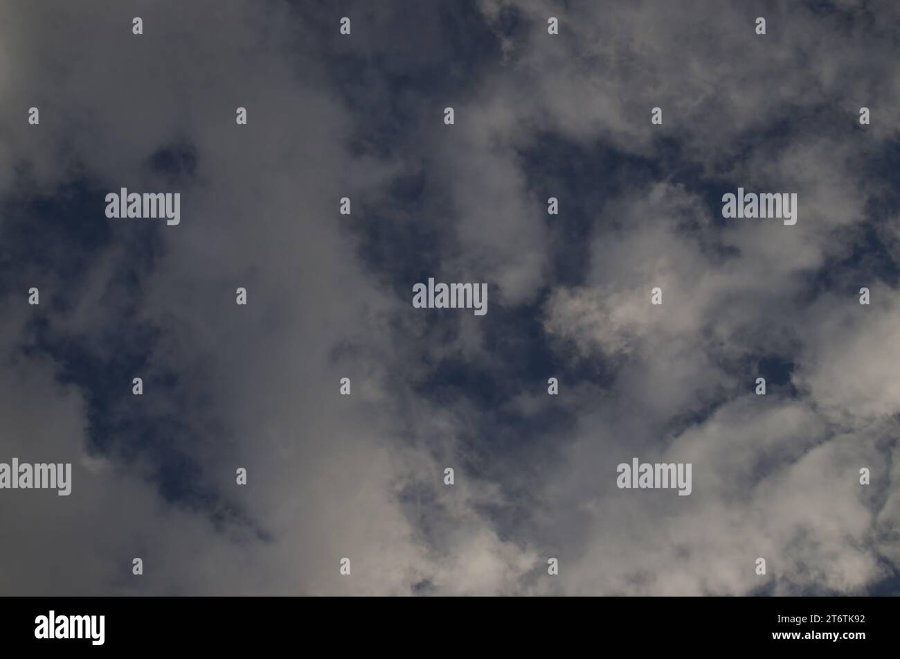 Background of rainy fluffy clouds floating on a bright blue sky, Sofia ...