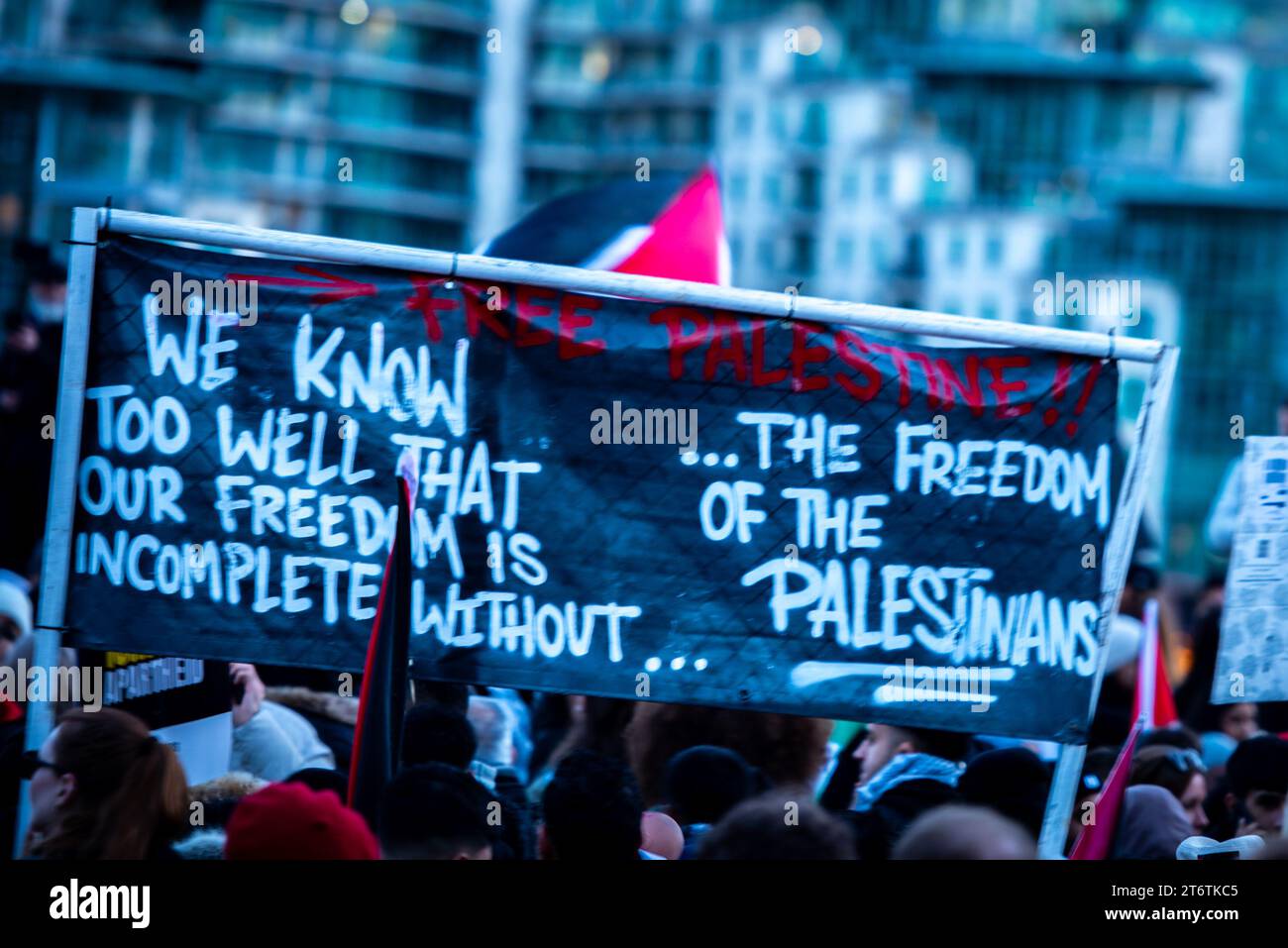 A protestor holds a large banner during the National March For ...