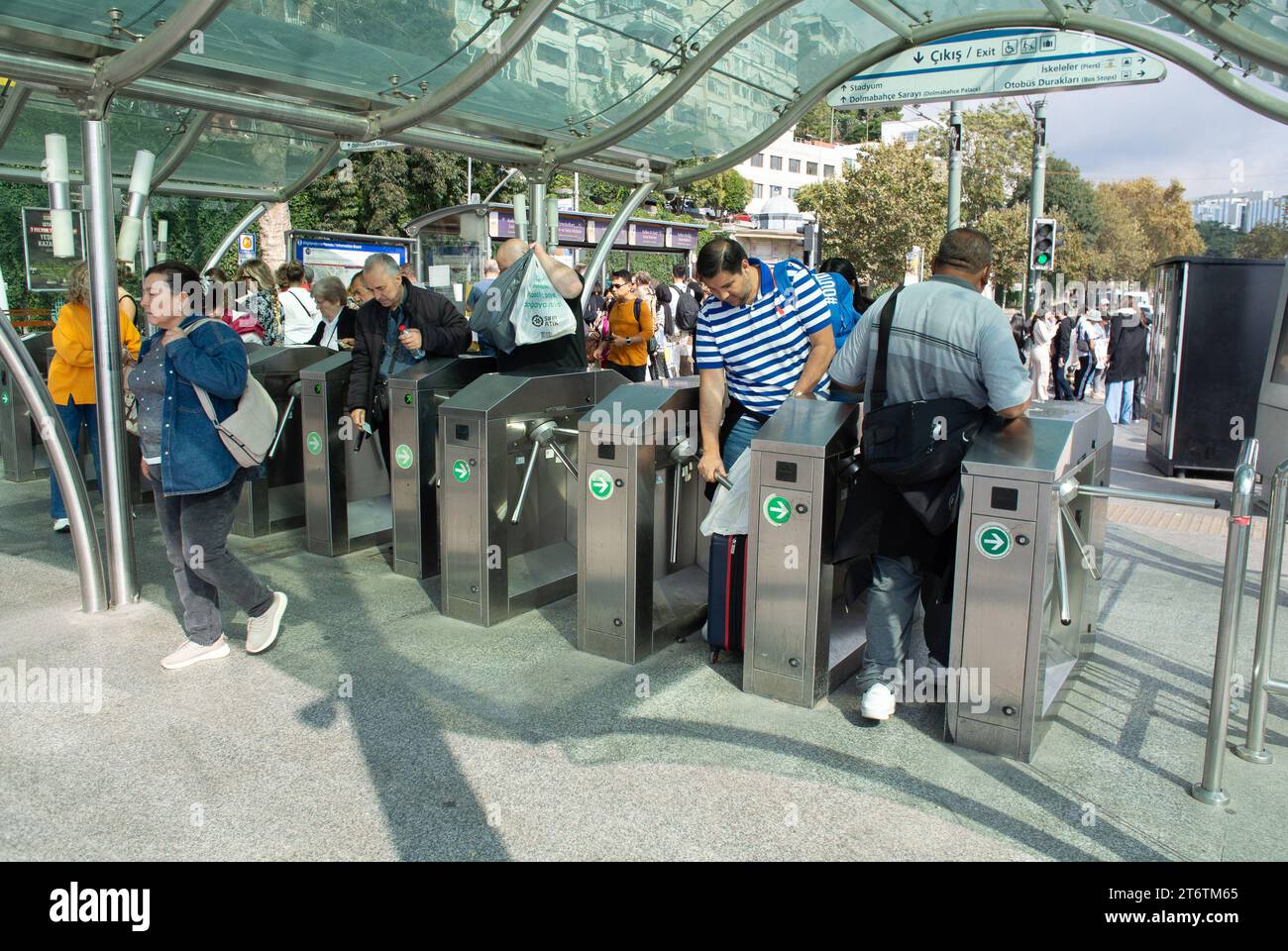 Istanbul, Turkey, People entering through turnstile at Eminonu ...