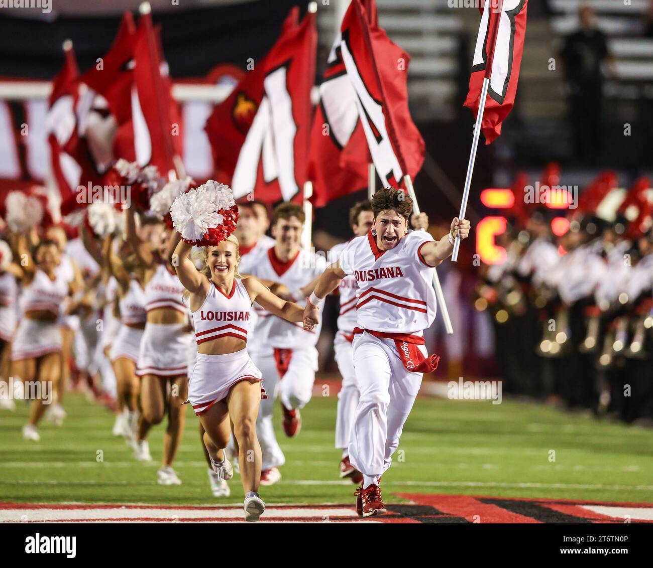 November 9, 2023: The Louisiana cheerleaders lead the football team ...