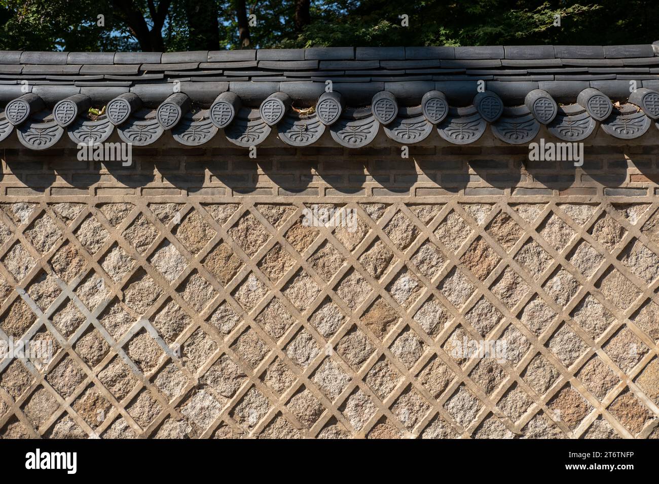 Korean traditional stone wall in Changdeokgung palace with beautiful ...