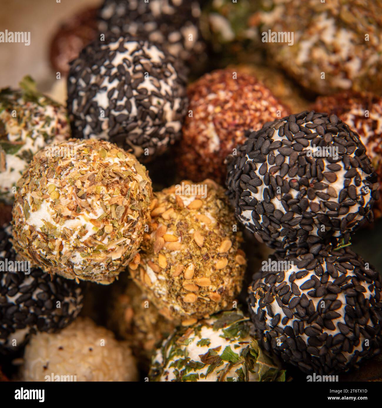 RECIPE FOR LABNEH CHEESE BOLLS WITH DRIED MINT, WHITE AND BLACK SESAME ...