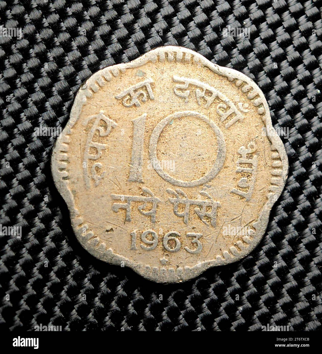 An antique token is displayed on a dark matte background Stock Photo ...