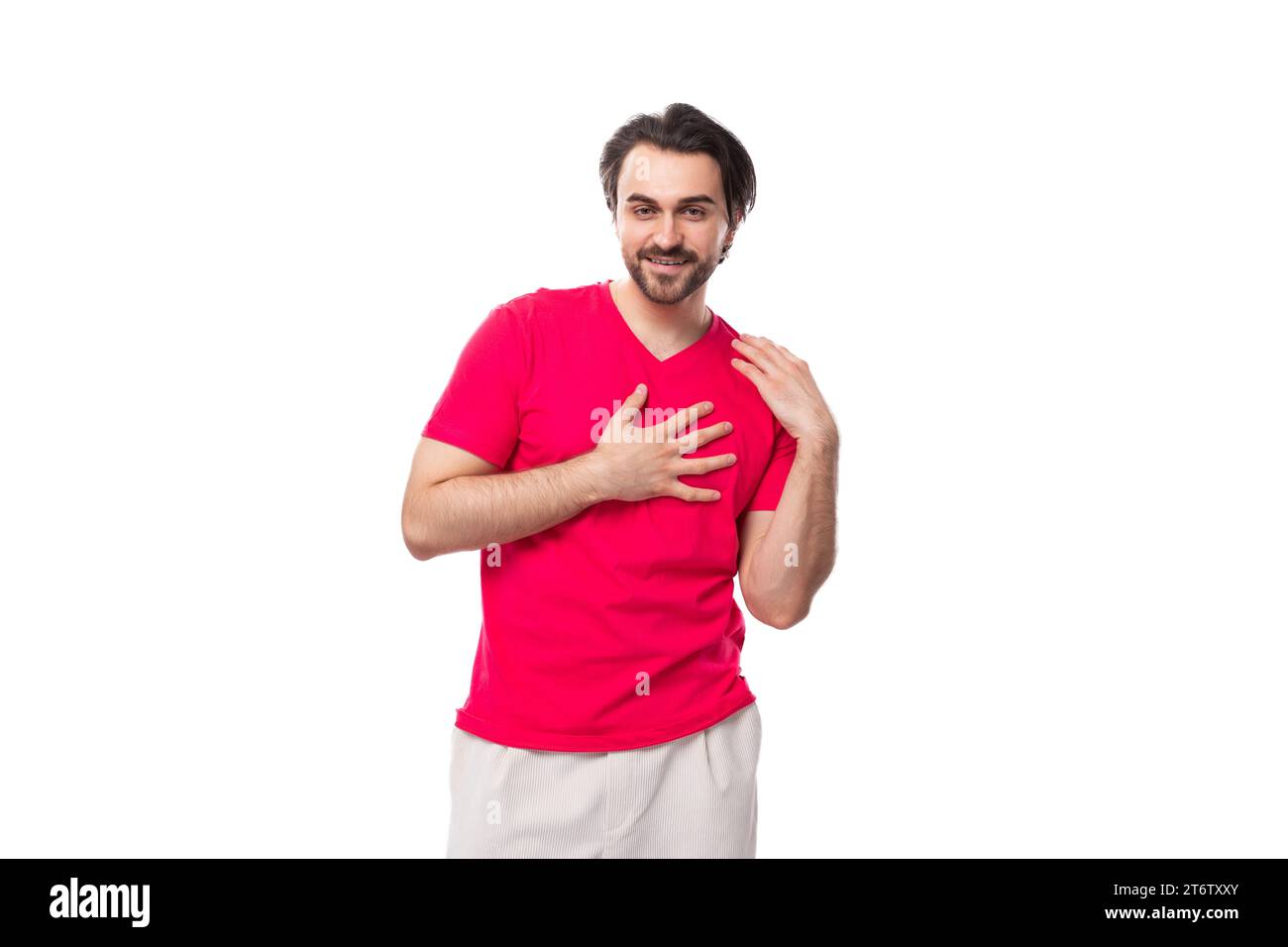 young slender brunette advertiser man dressed in a red t-shirt with a ...