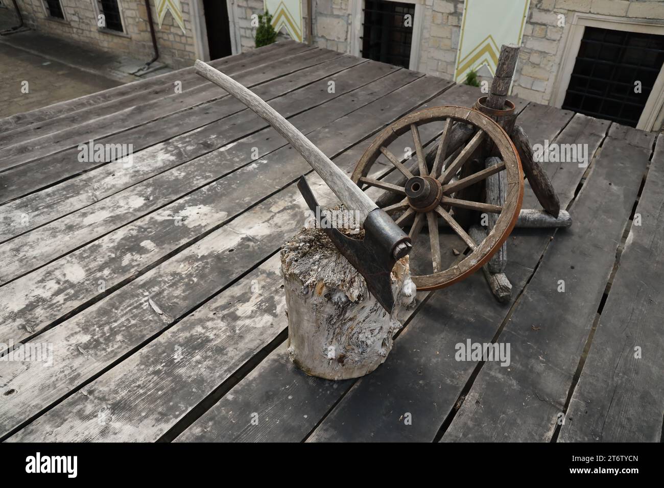 TERNOPIL, UKRAINE - AUGUST 23, 2023 Axe of executioner on wooden stump ...