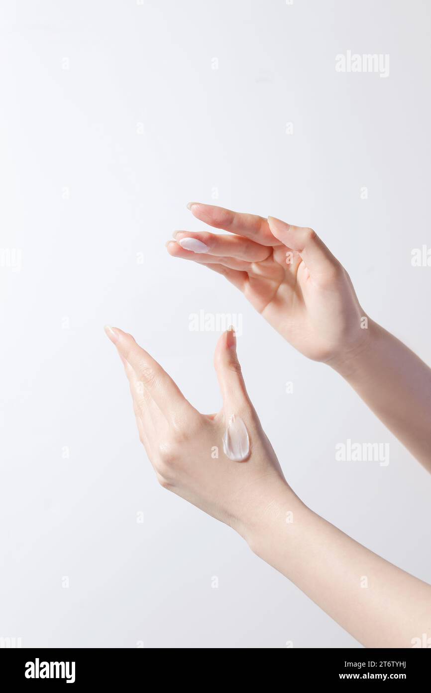 Beautiful Woman Hands Female Hands Applying Cream Stock Photo - Alamy