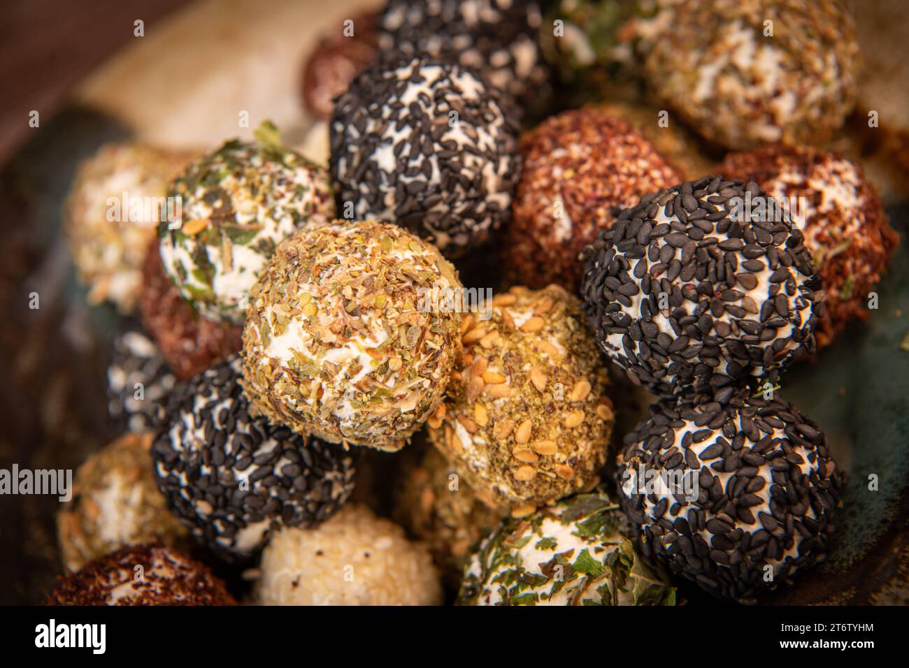 RECIPE FOR LABNEH CHEESE BOLLS WITH DRIED MINT, WHITE AND BLACK SESAME ...