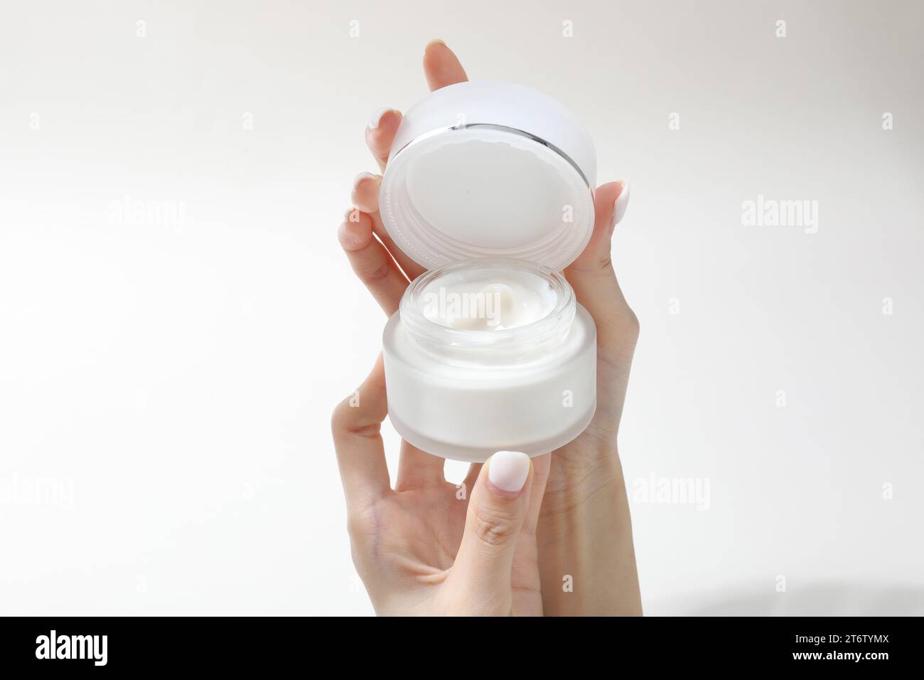 Beautiful Woman Hands Female Hands Applying Cream Stock Photo - Alamy