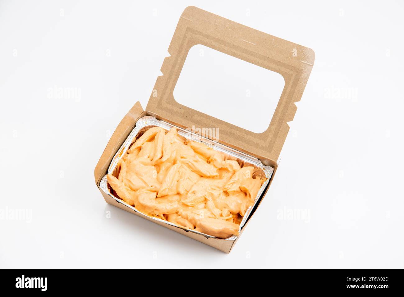 An isolated shot of an open cardboard box containing cheese Stock Photo ...