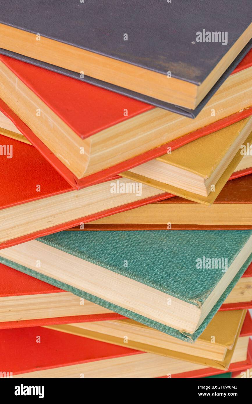 abstract books background - old red and muted green ones in a vertical ...