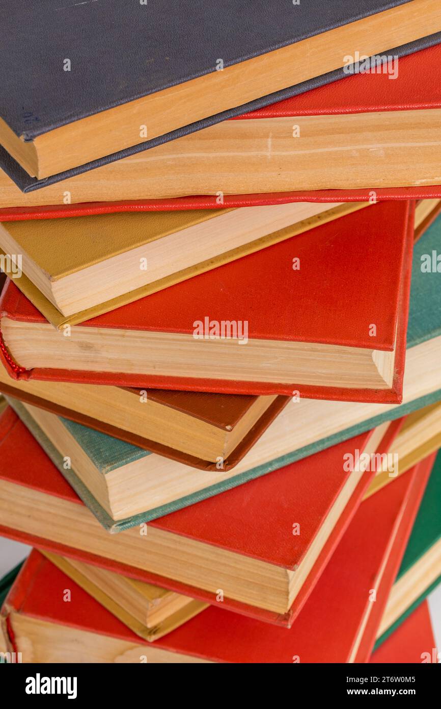 abstract books background - old red and muted green ones in a vertical ...