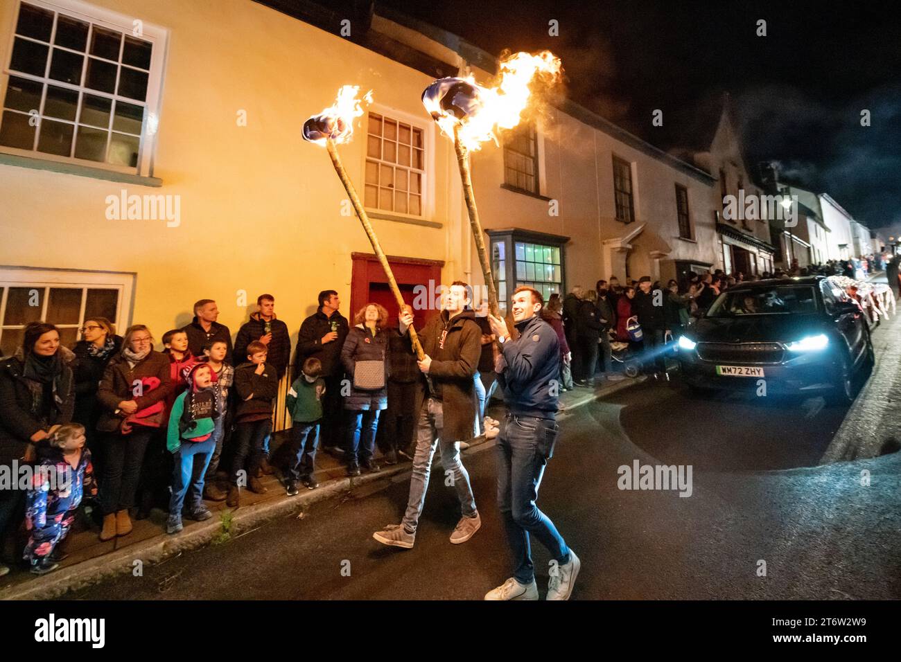 Hatherleigh, UK. , . Flaming parade in the Hatherleigh Carnival & Tar Barrels at night in Devon ...