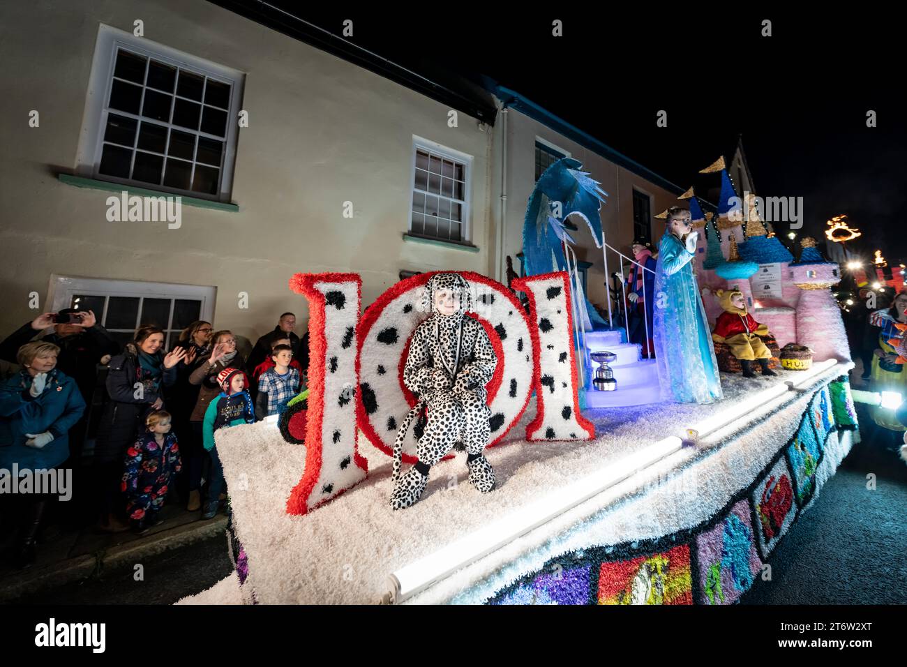 Hatherleigh, UK. , . Colourful parade floats in the Hatherleigh Carnival & Tar Barrels at night ...
