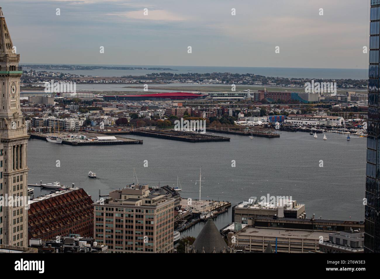 An aerial view of a bustling metropolitan cityscape featuring a clock ...