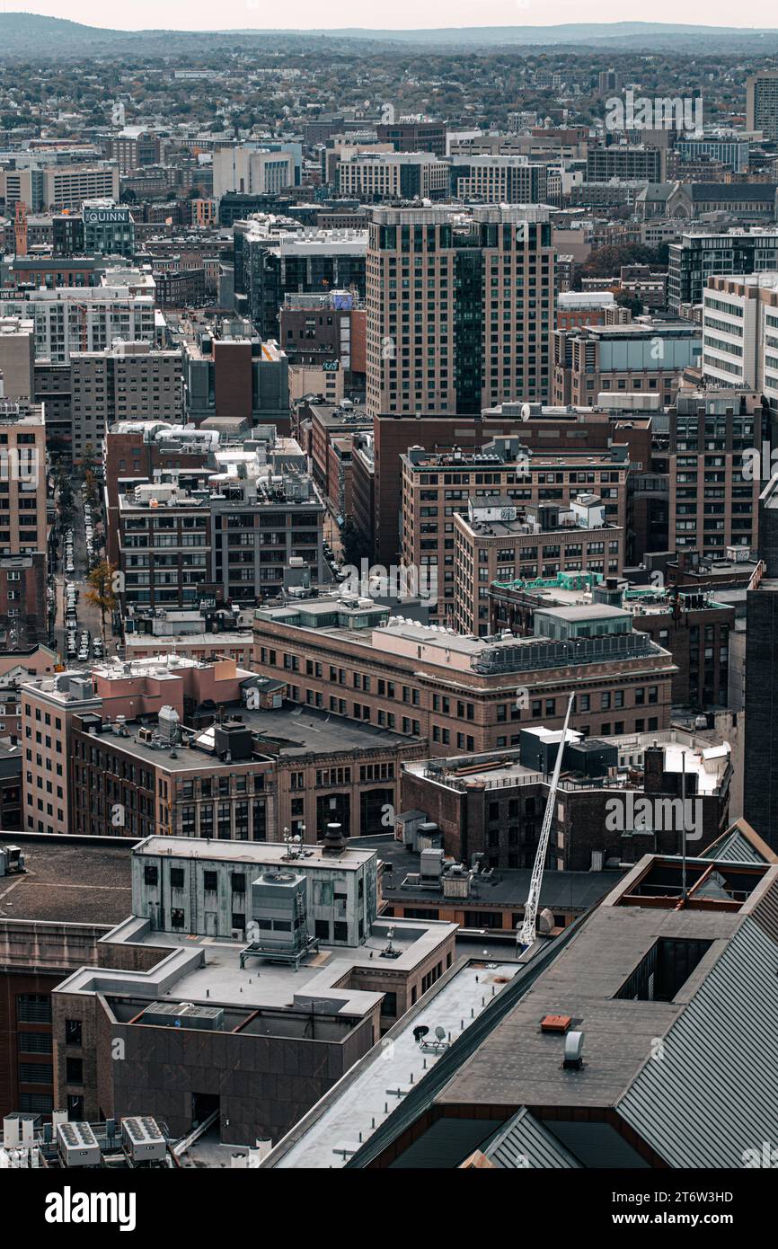 Aerial view of a bustling cityscape with towering skyscrapers and busy ...